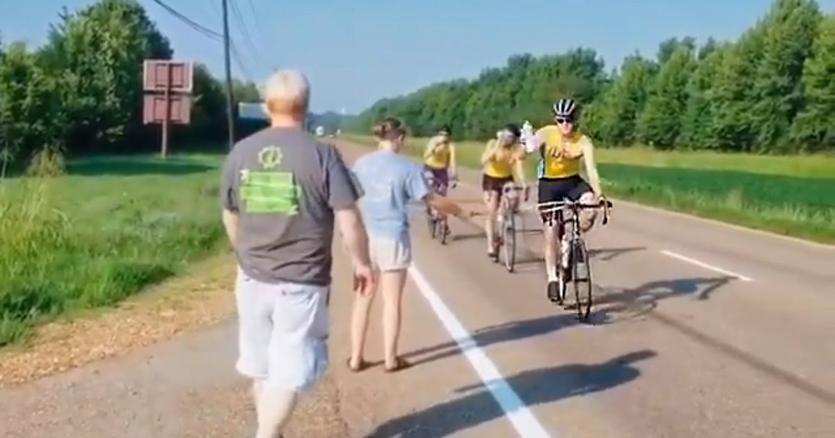 Volunteer Causes Cyclist To Crash | Webfail - Fail Pictures and Fail Videos